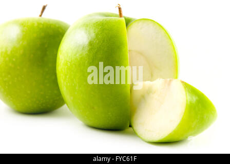 Big and small apples. Two ripe apples, red and green isolated on white ...
