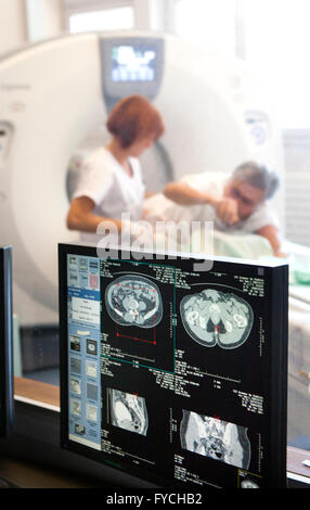 An elderly male patient undergoing a scan Stock Photo - Alamy