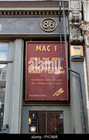 Sign in the window of a phone repair shop in Liverpool Stock Photo - Alamy