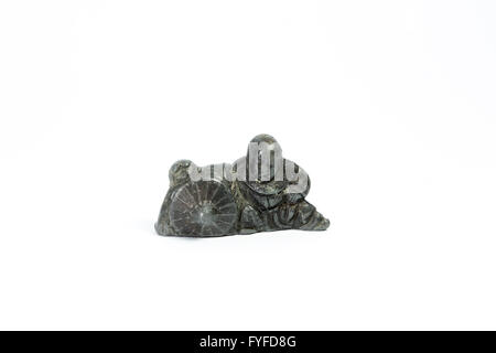 Chinese figurine of paunchy man on a white background Stock Photo - Alamy