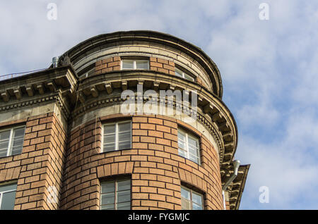 Modern residential building exterior closeup with balconies and wind ...