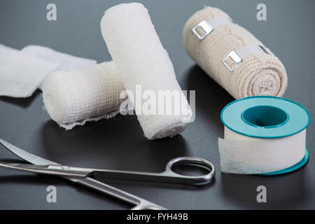 Medical bandages with sticking plaster, isolated on white Stock Photo ...
