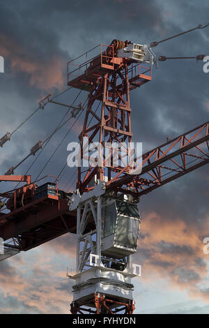 mobile crane lifting generator, silhouettes at sunset Stock Photo - Alamy