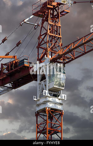 mobile crane lifting generator, silhouettes at sunset Stock Photo - Alamy