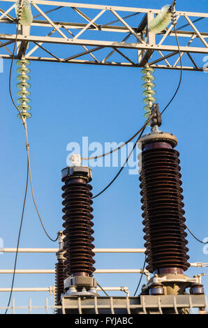 High-voltage insulators on transformer substation Stock Photo - Alamy