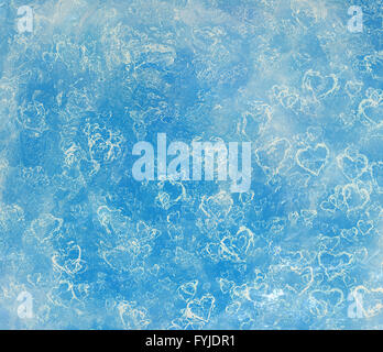 Ice frozen heart symbol of blue color close-up isolated on a white ...