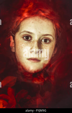 Young drown woman in a poetic representation. The concept of the undead ...