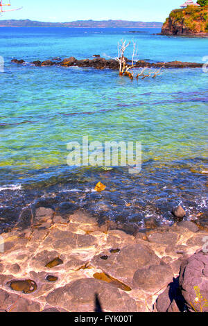 cloudy in indian ocean madagascar mountain sand isle beach sky and boat ...