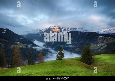 Cloudy sunrise over Dolomite mountains. Italian Dolomites Stock Photo ...
