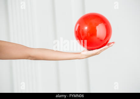 Red ball for rhythmic gymnastics Stock Photo - Alamy