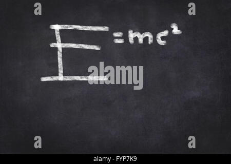 E=mc2 handwritten with white chalk on a blackboard Stock Photo - Alamy