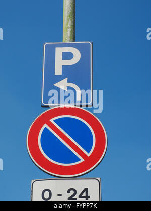 No parking sign over blue sky Stock Photo - Alamy