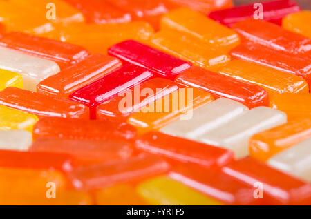 Closeup rectangular colorful shiny hard candy lined up Stock Photo - Alamy