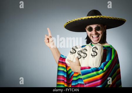 Mexican man with money sacks Stock Photo - Alamy