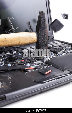 Smashing keyboard with hammer Stock Photo - Alamy