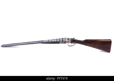 Classic trigger double-barreled hunting rifle on a wooden background ...