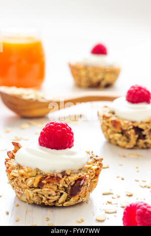 Healthy Breakfast Oatmeal Cups with Raspberries Stock Photo - Alamy