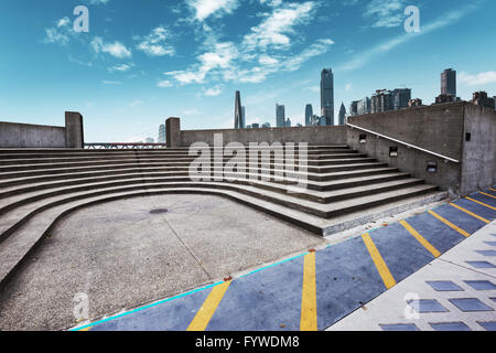 skyline on view of empty ground with steps Stock Photo - Alamy