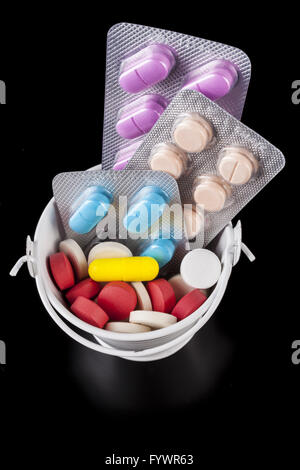 Pharmaceutical tablets in the bucket Stock Photo - Alamy