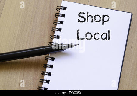 Shop local write on notebook Stock Photo - Alamy
