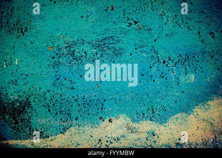 Detailed image of very old and aged color graffiti drawing on the wall ...