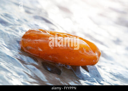 Amber stone in a closeup Stock Photo - Alamy