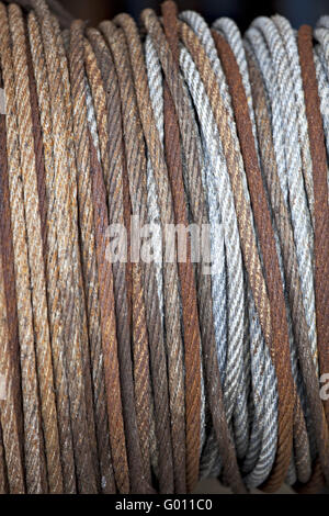 Detail of a rusty roll of steel cable Stock Photo - Alamy