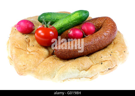 smoked sausage in pita bread on a dark wooden background.photo with ...