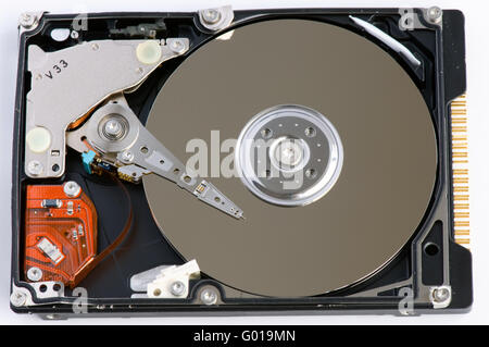 Opened hard disk showing the disk surface and drive head Stock Photo ...