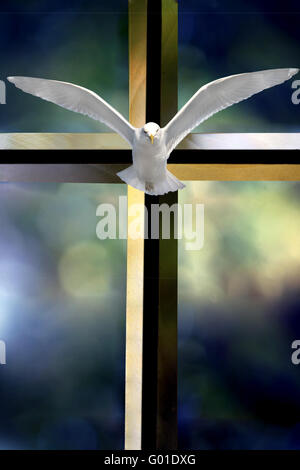 The cross of Jesus and the dove are a symbol of the Holy Spirit Stock ...