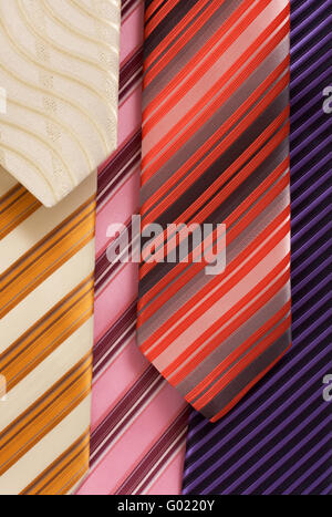 Fabric background from multi coloured striped ties Stock Photo - Alamy