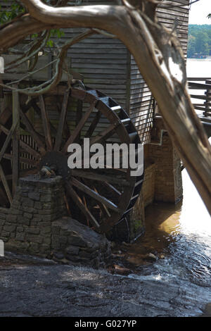 Old grist mill wooden water wheel by a stream Stock Photo - Alamy
