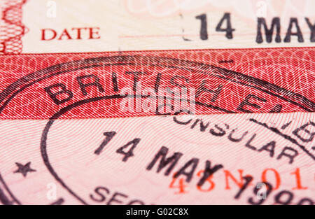 foreign passport with a British Immigration Visa stamps Stock Photo - Alamy