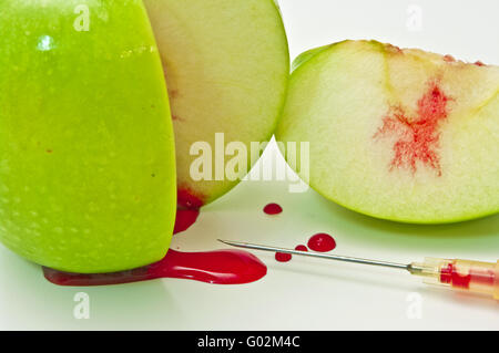 Blood drawn out of green apple Stock Photo - Alamy