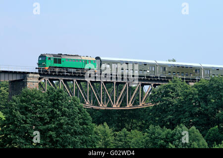 Goods Train Passing through the Steel Railway Bridge crossing the Stock ...