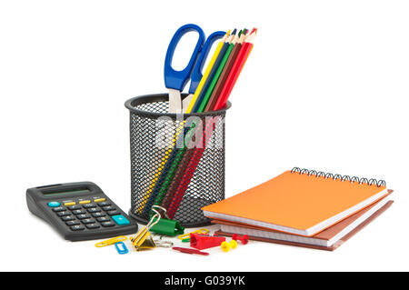 Set of different stationery with sharpener on color background Stock ...