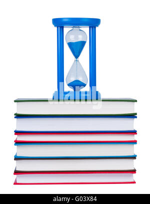 Hourglass and books isolated on white background Stock Photo - Alamy