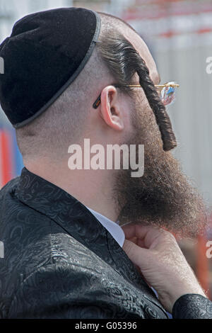 Close up of an ultra religious Jewish man's peyot outdoors in Coney ...