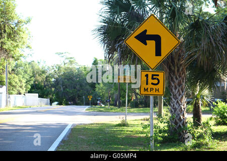 Slow sign on bend in road, Cornwall UK Credit: David Levenson Stock ...