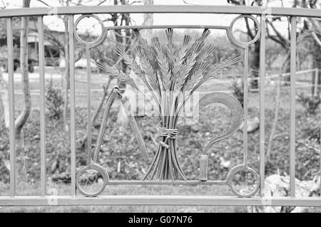 sheaf, flail and sickle forged Stock Photo - Alamy