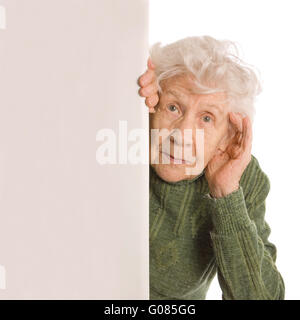 The old woman spies isolated on white background Stock Photo - Alamy