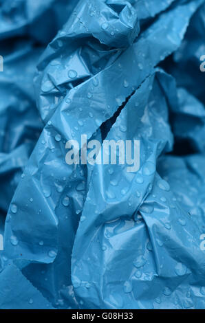 Wet crumpled plastic cover surface with drops of rain Stock Photo - Alamy