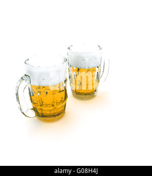 A set of full beer mugs at a pub Stock Photo - Alamy
