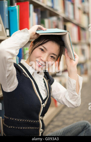 beautiful young girl near library Stock Photo - Alamy