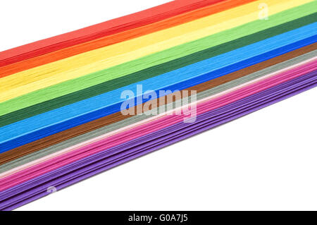 Strips of multi-colored colorful paper, all colors of the rainbow and ...