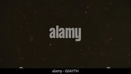 orange particles like spark slowly float in air Stock Photo - Alamy