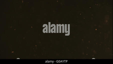 orange particles like spark slowly float in air Stock Photo - Alamy