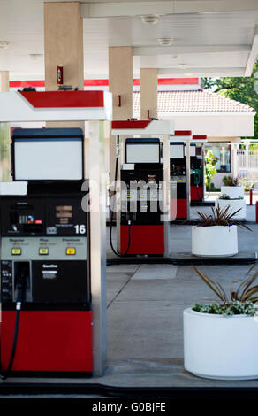 Gas station fuel pumps for different types of gasoline and diesel ...