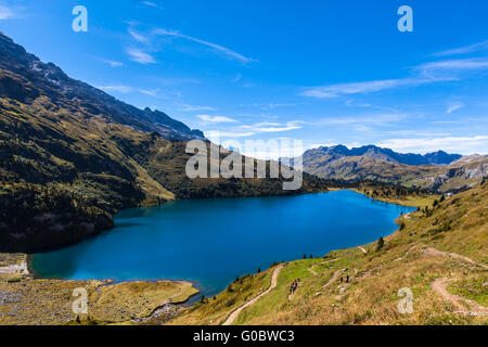 Aerial view of Engstlensee lake and the Alps on a sunny day on Bernese ...