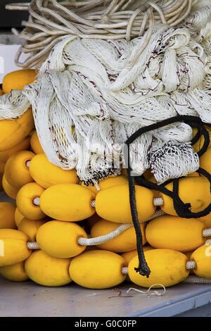 fishing nets on the vessel rolled Stock Photo - Alamy